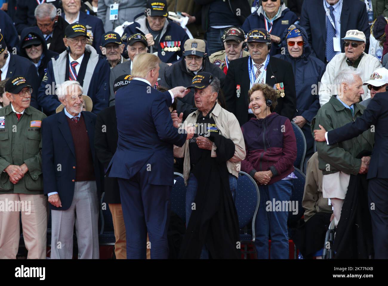 US President Donald Trump ( salutes World War II veterans at a Franco ...