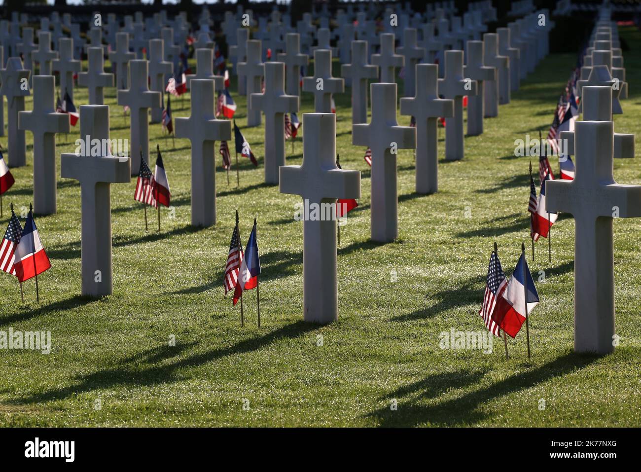 Tombs crosses are pictured during a ceremony commemorating the 75th ...