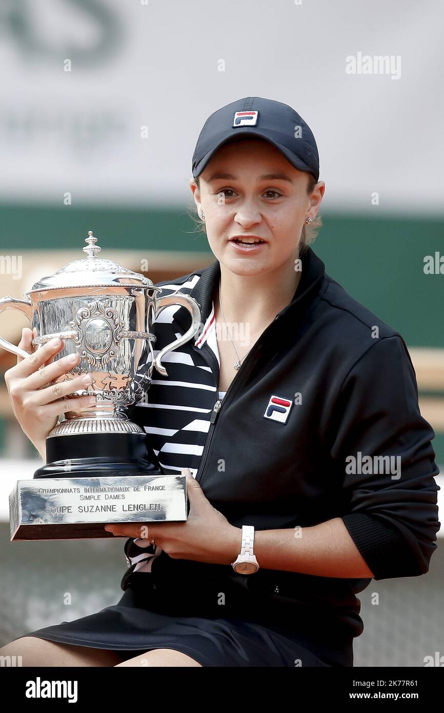 Ashleigh Barty of Australia celebrates victory with the trophy ...