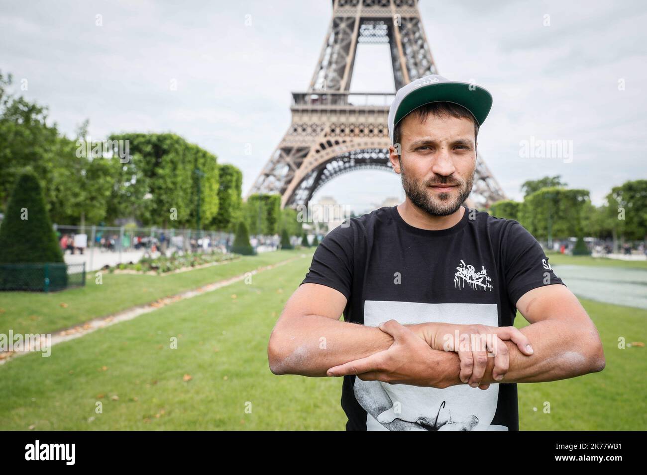French street artist Saype presents at the Eiffel Tower his giant ...