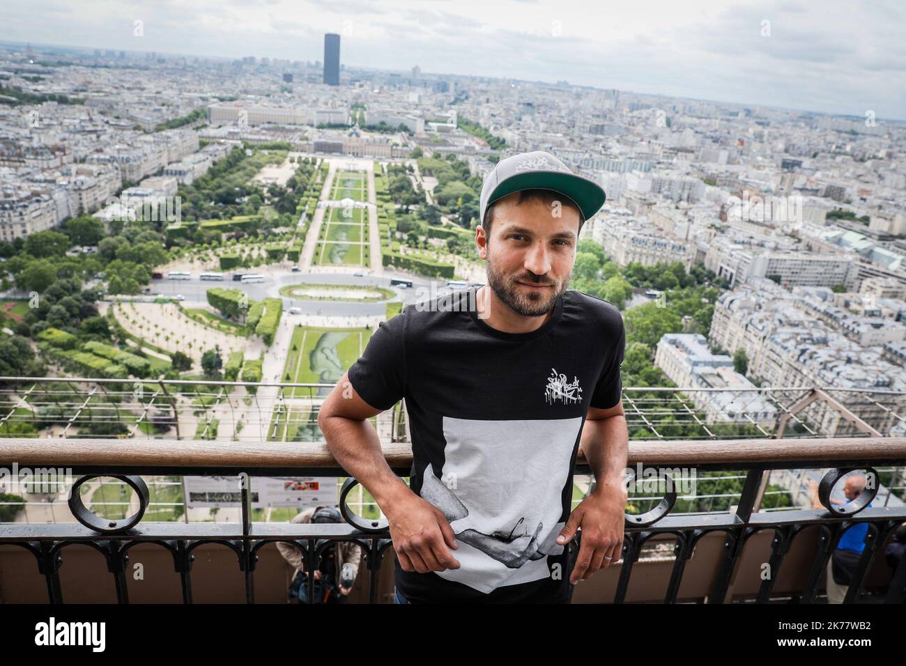 French street artist Saype presents at the Eiffel Tower his giant ...