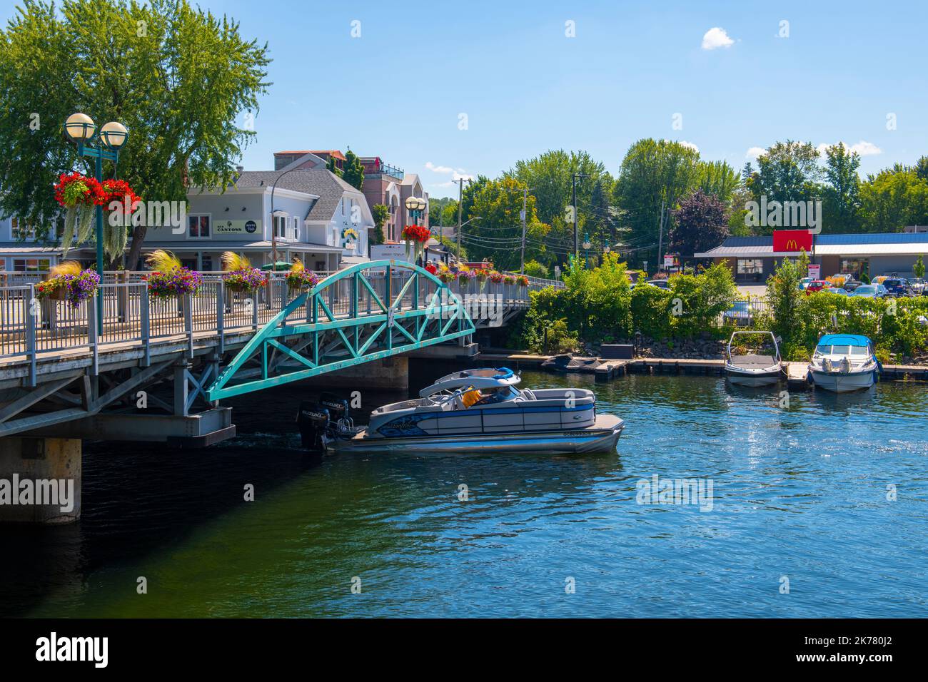 Riviere Magog River bridge on Rue Merry N Street in downtown Magog ...