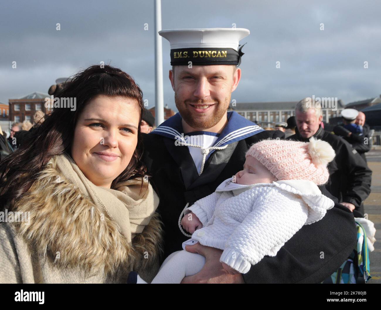 Rebecca and AWE Gaz Hutton with their 10 week ols baby Ava are reunited ...
