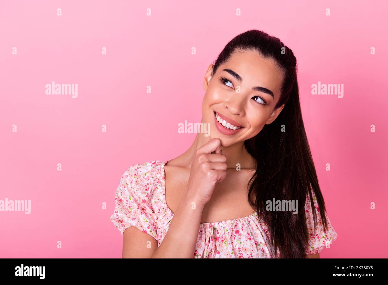 Portrait of pretty positive minded vietnamese girl arm touch chin look ...