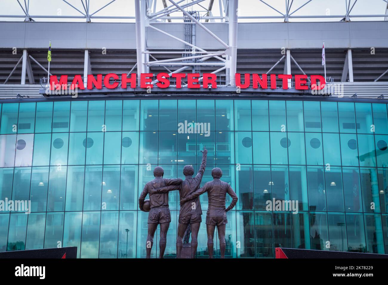 Facade of Old Trafford stadium with Manchester United's name Stock ...