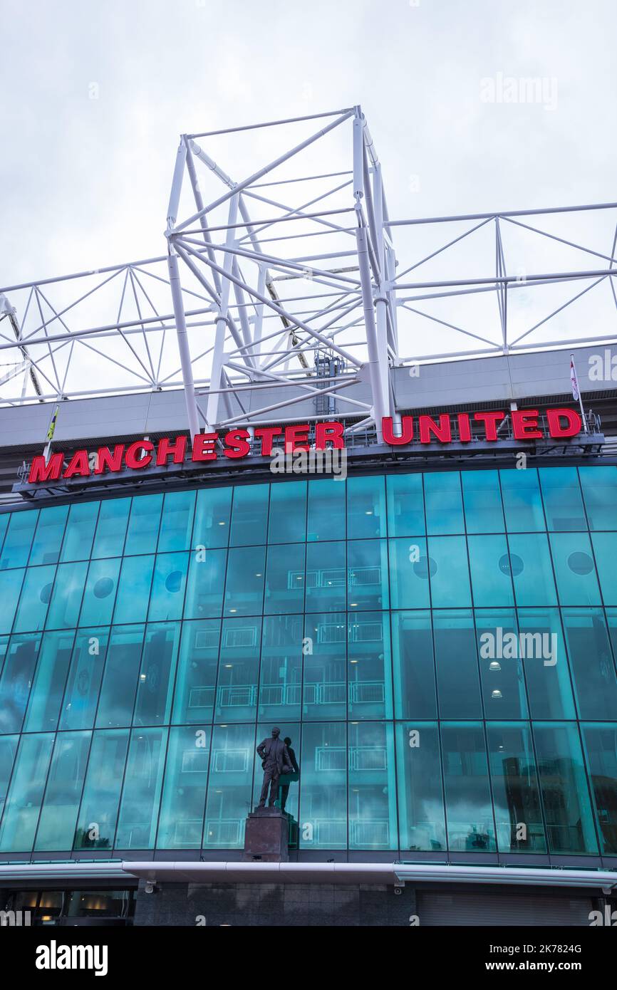 Facade of Old Trafford stadium with Manchester United's name Stock ...