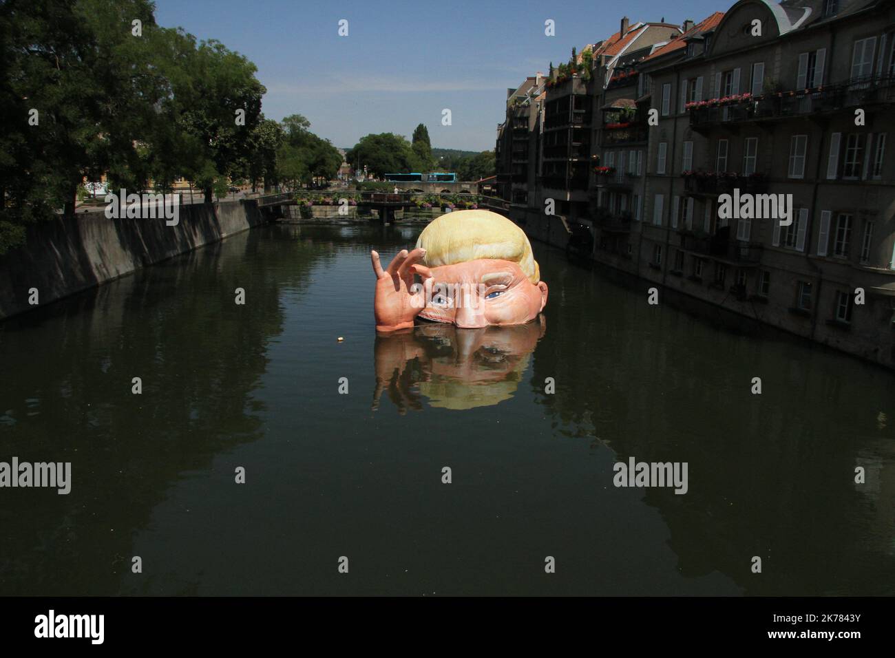 The installation "Everything is fine" depicting the half submerged head ...