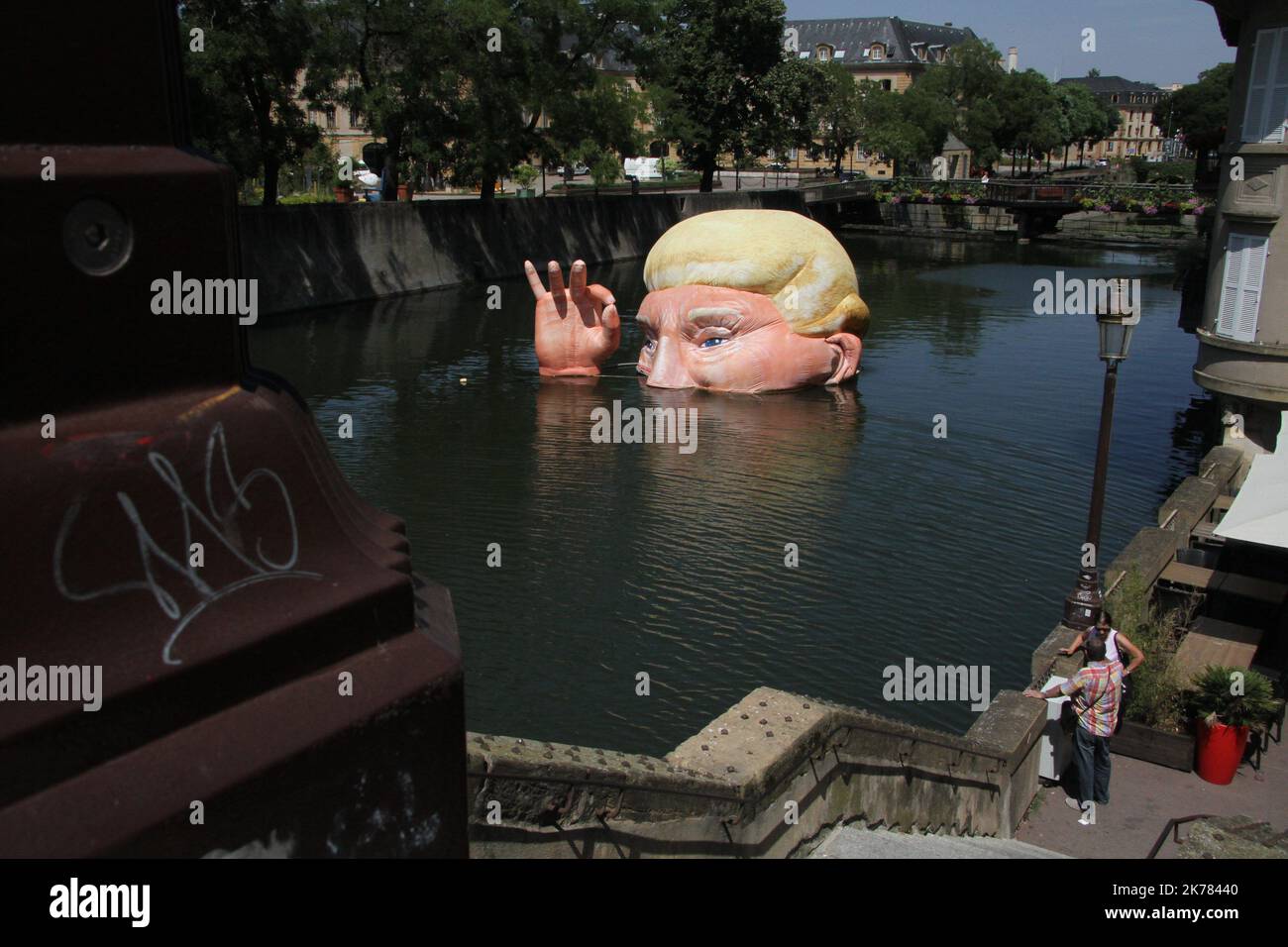 The installation "Everything is fine" depicting the half submerged head ...