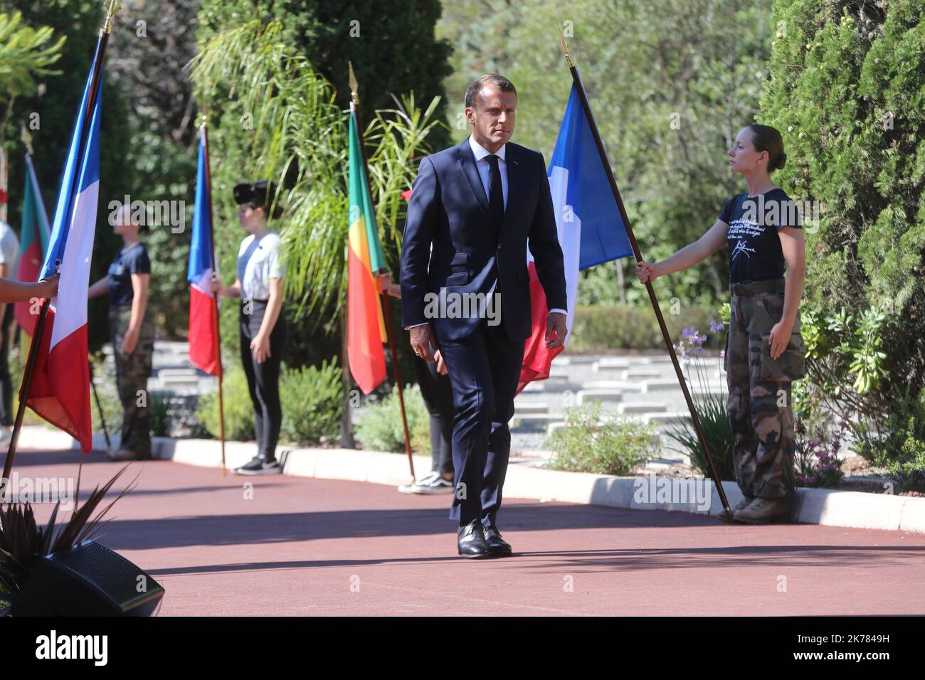 French President Emmanuel Macron arrives to attend a ceremony marking ...