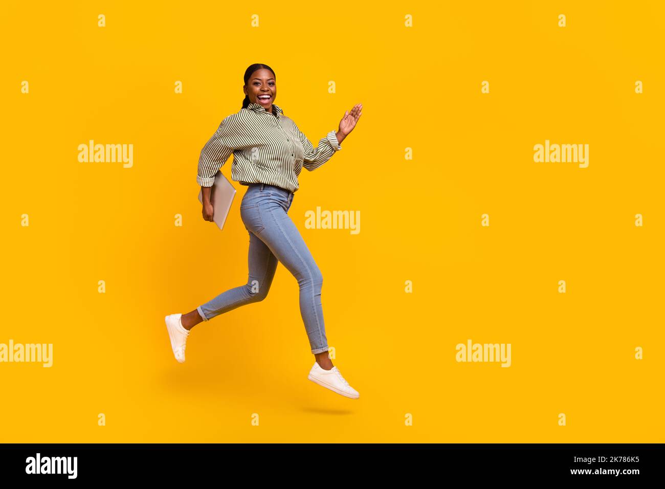 Full size profile photo of cheerful lady hold netbook rush hurry ...