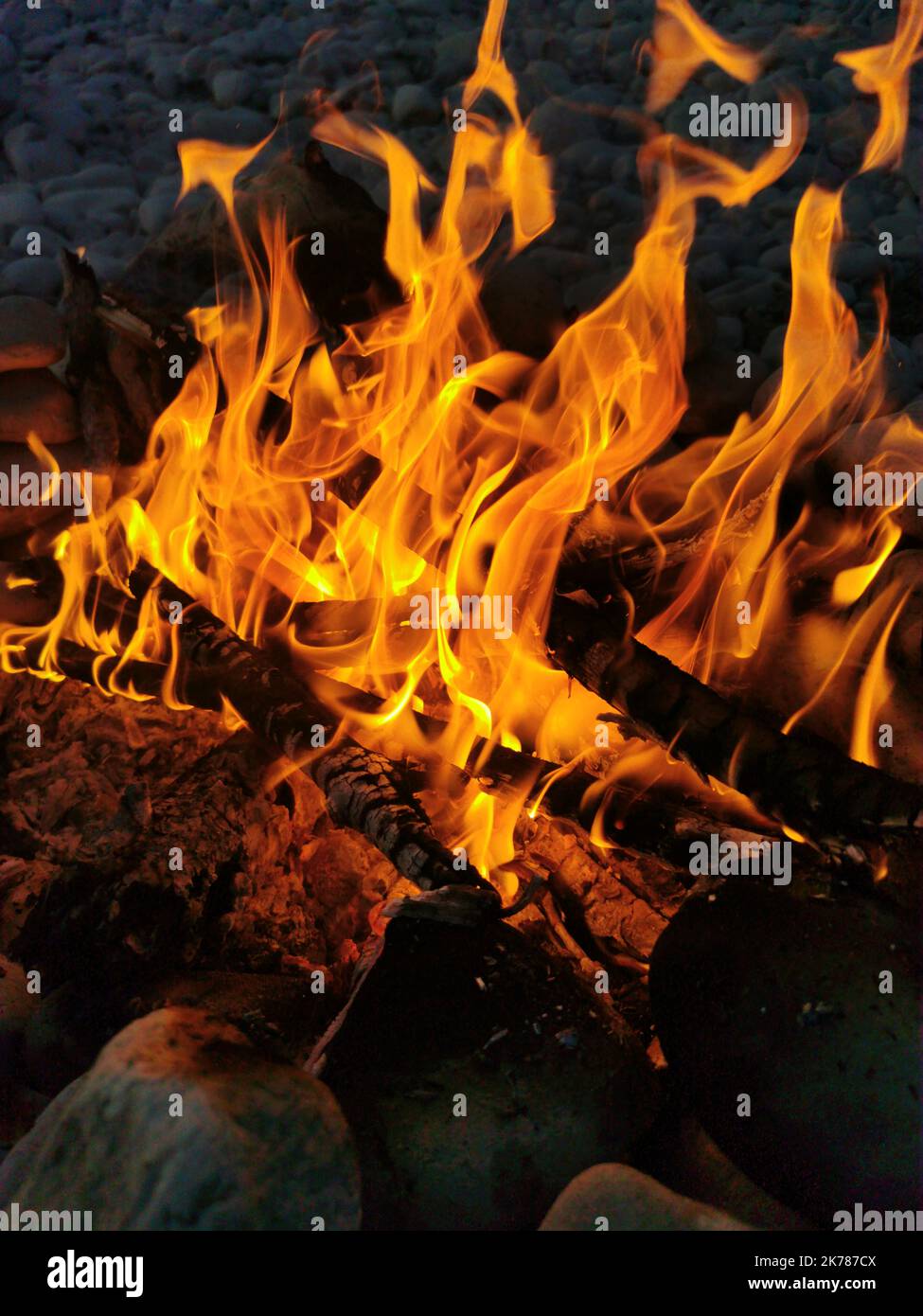 A huge fire by the river in a stone Stock Photo - Alamy
