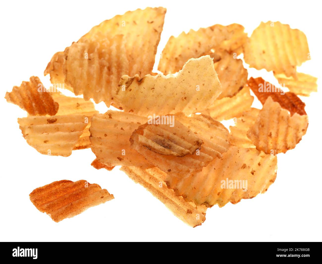 Clean background crinkle cut potato crisps in close up, food snack ...