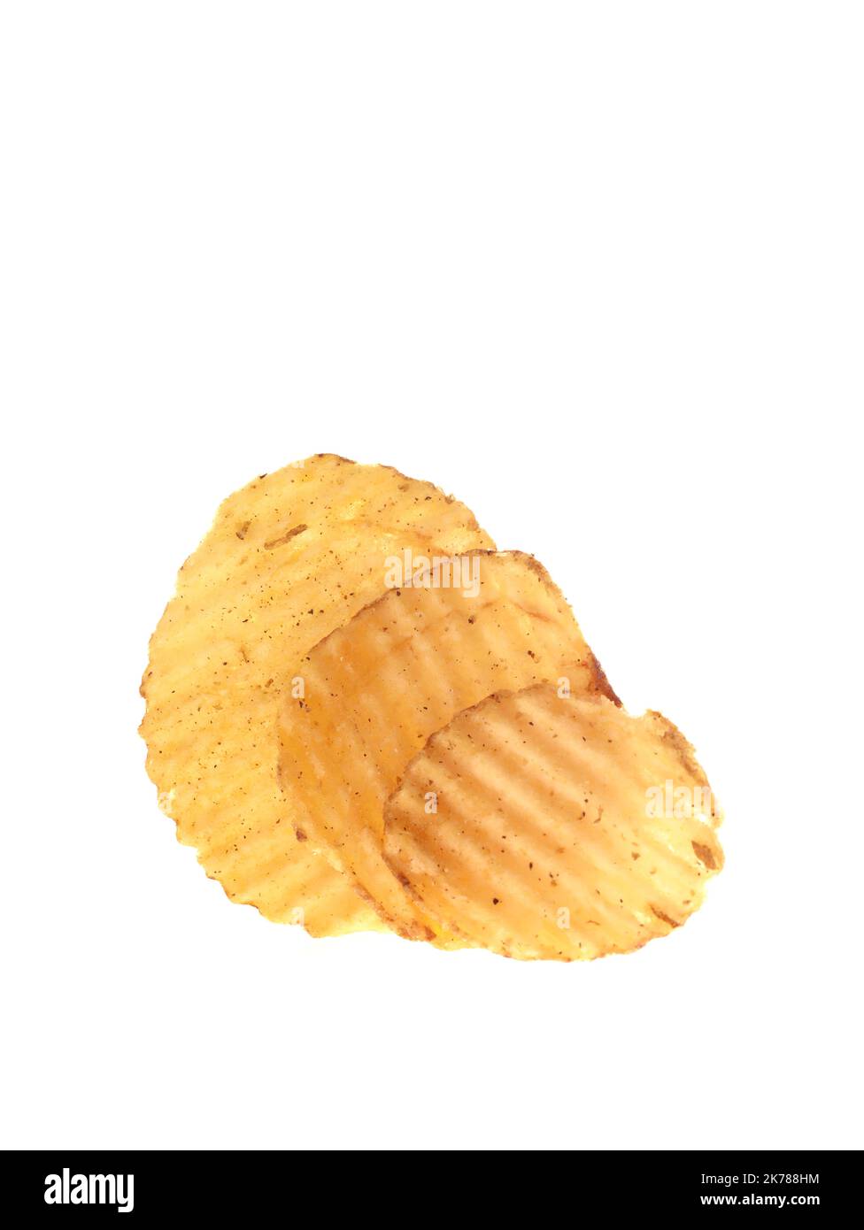 Clean background crinkle cut potato crisps in close up, food snack ...