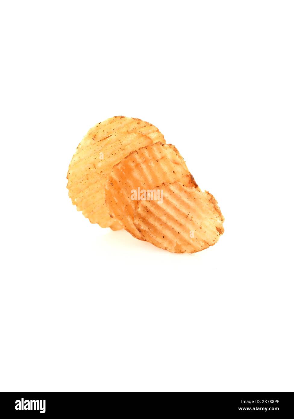 Clean background crinkle cut potato crisps in close up, food snack ...