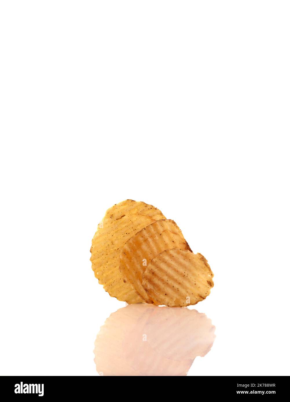 Clean background crinkle cut potato crisps in close up, food snack ...