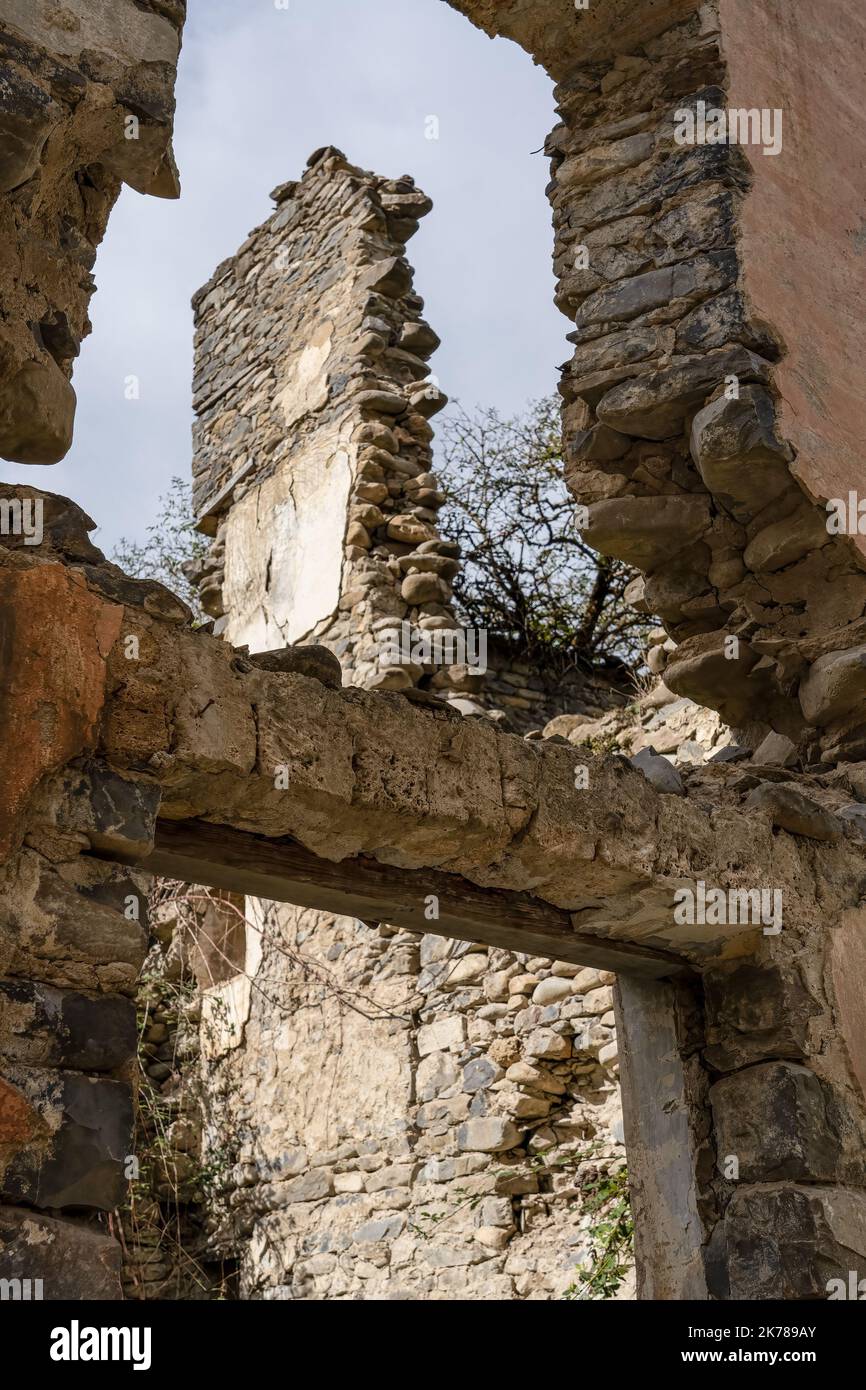 stone built walls and ruined buildings in an abandoned Spanish Pyrenees ...