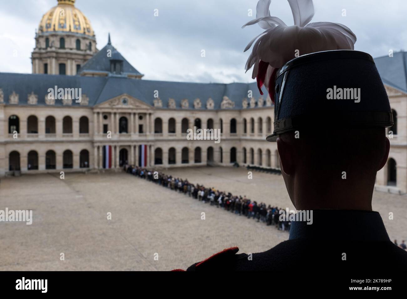 People queue at the entrance of Saint-Louis-des-Invalides Cathedral ...