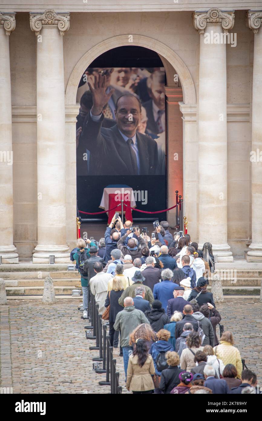 People queue at the entrance of Saint-Louis-des-Invalides Cathedral ...
