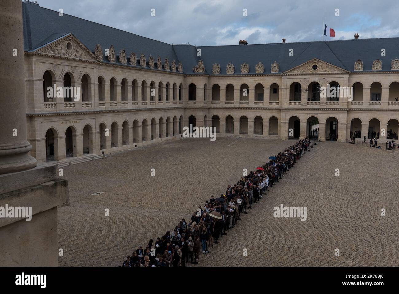 People queue at the entrance of Saint-Louis-des-Invalides Cathedral ...
