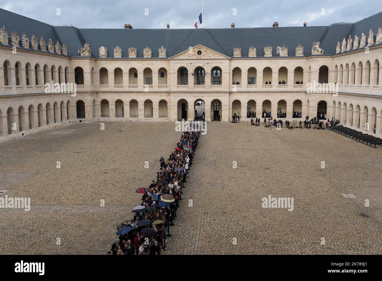 People queue at the entrance of Saint-Louis-des-Invalides Cathedral ...