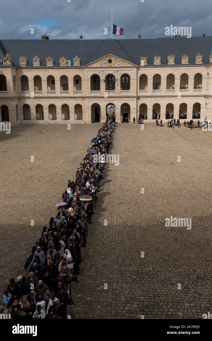 People queue at the entrance of Saint-Louis-des-Invalides Cathedral ...
