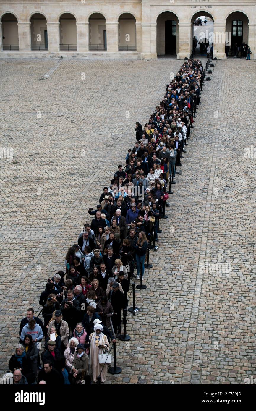 People queue at the entrance of Saint-Louis-des-Invalides Cathedral ...