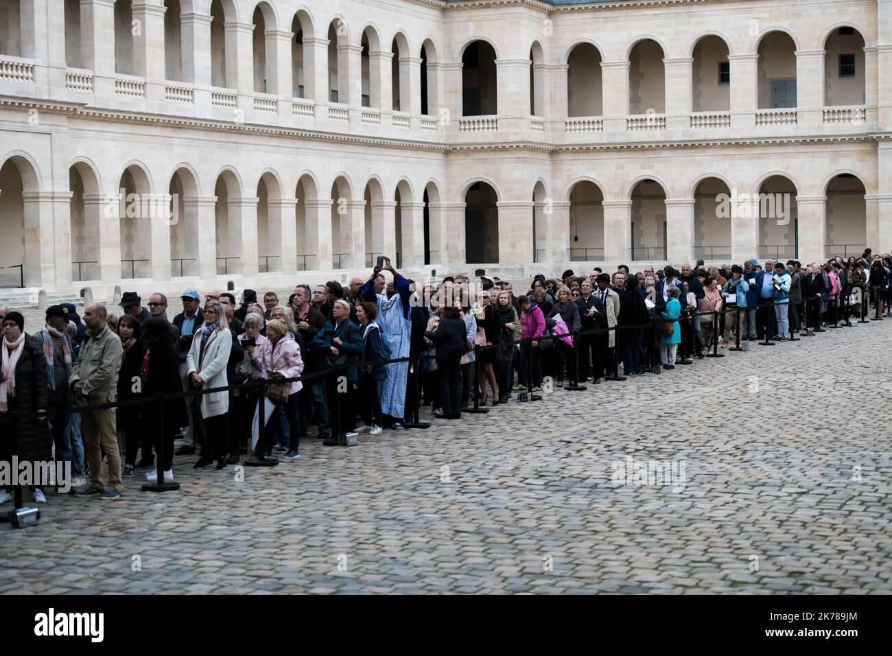 People queue at the entrance of Saint-Louis-des-Invalides Cathedral ...