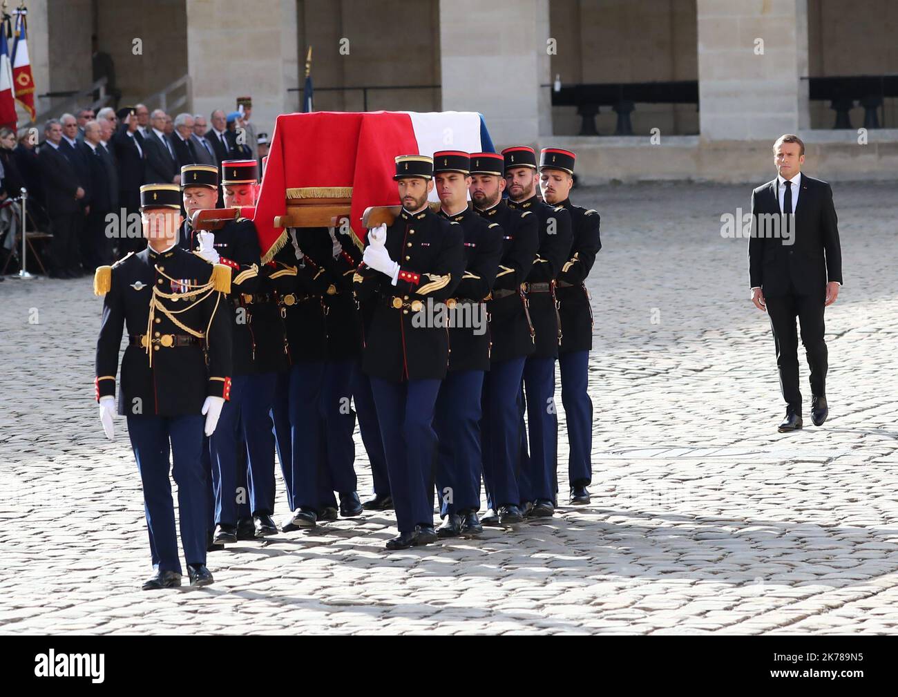 French President during the funeral honors paid to the former French ...