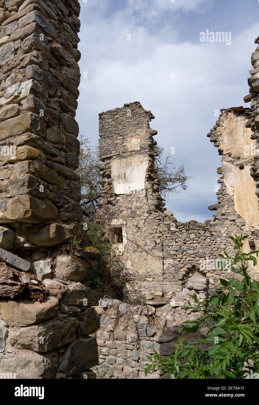 stone built walls and ruined buildings in an abandoned Spanish Pyrenees ...