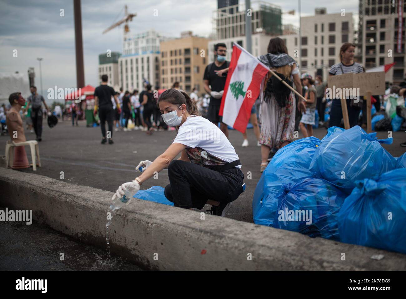 Protesters organise to clean up after the previous day's rallies. Some ...