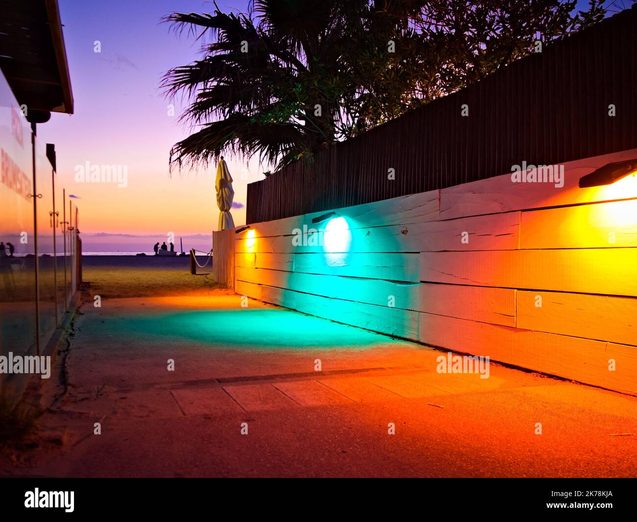 Entrance to the beaches of the Mediterranean Sea with colored ...