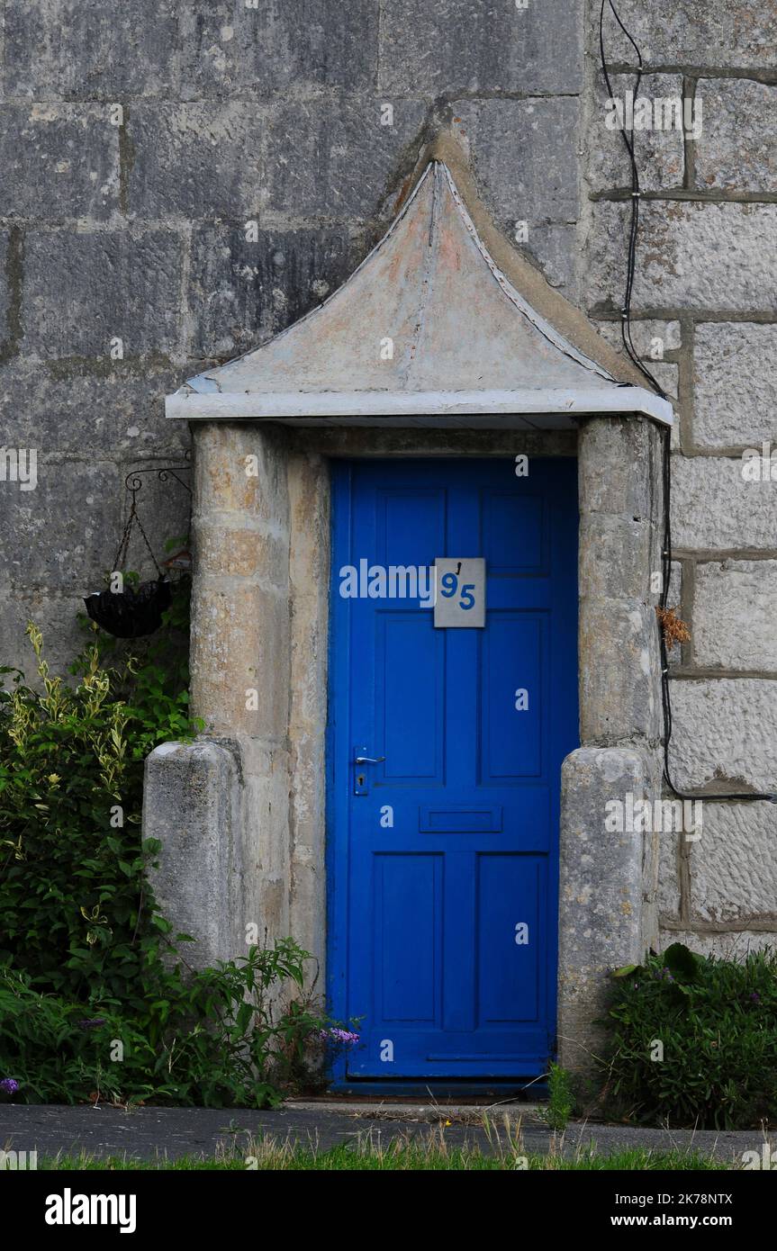 Portland stone house porch with colonial style roof Stock Photo - Alamy