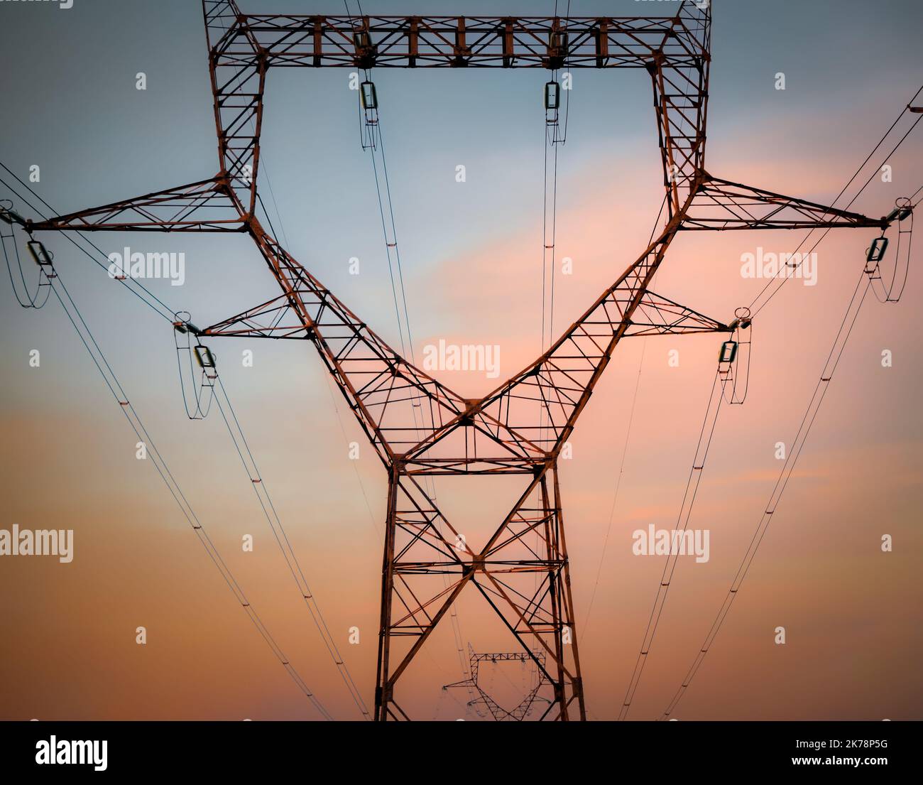 High voltage power line at sunset Stock Photo - Alamy