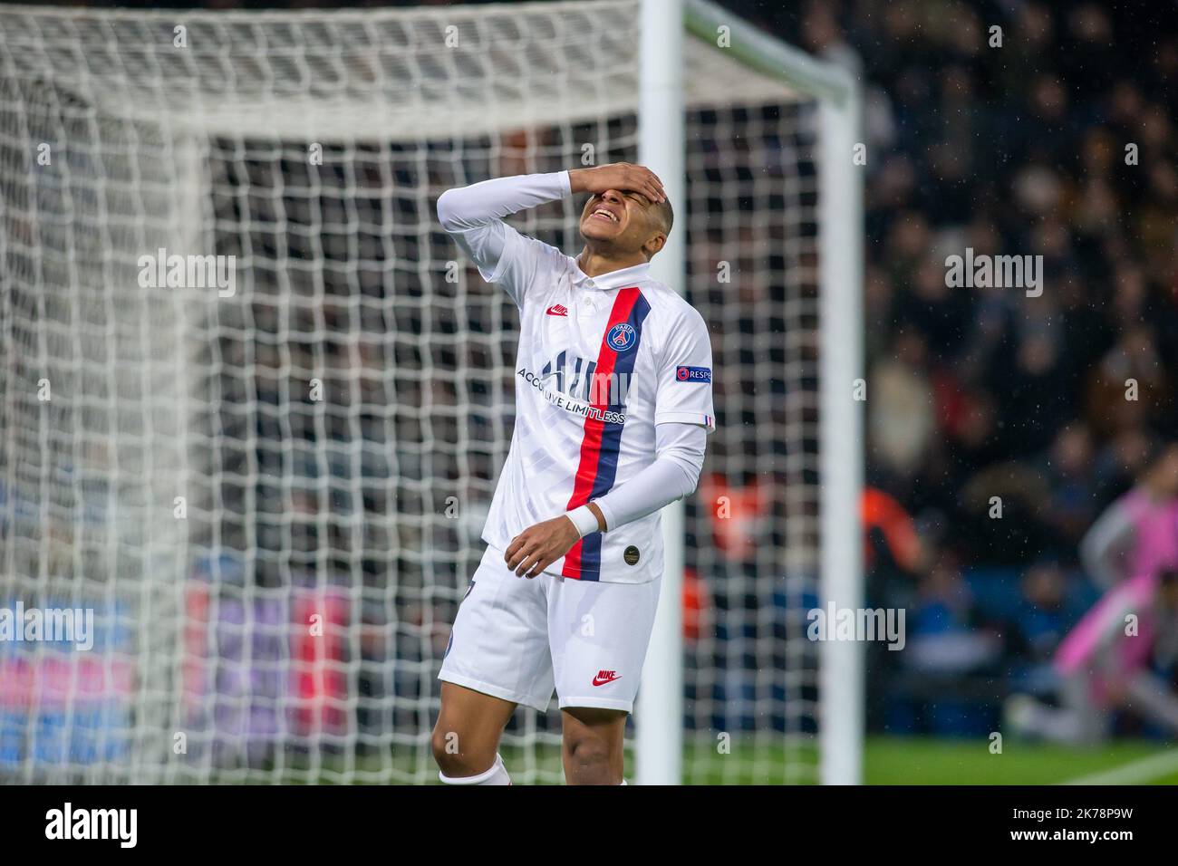 Paris Saint Germain's Kylian Mbappe reacts on the pitch Stock Photo - Alamy