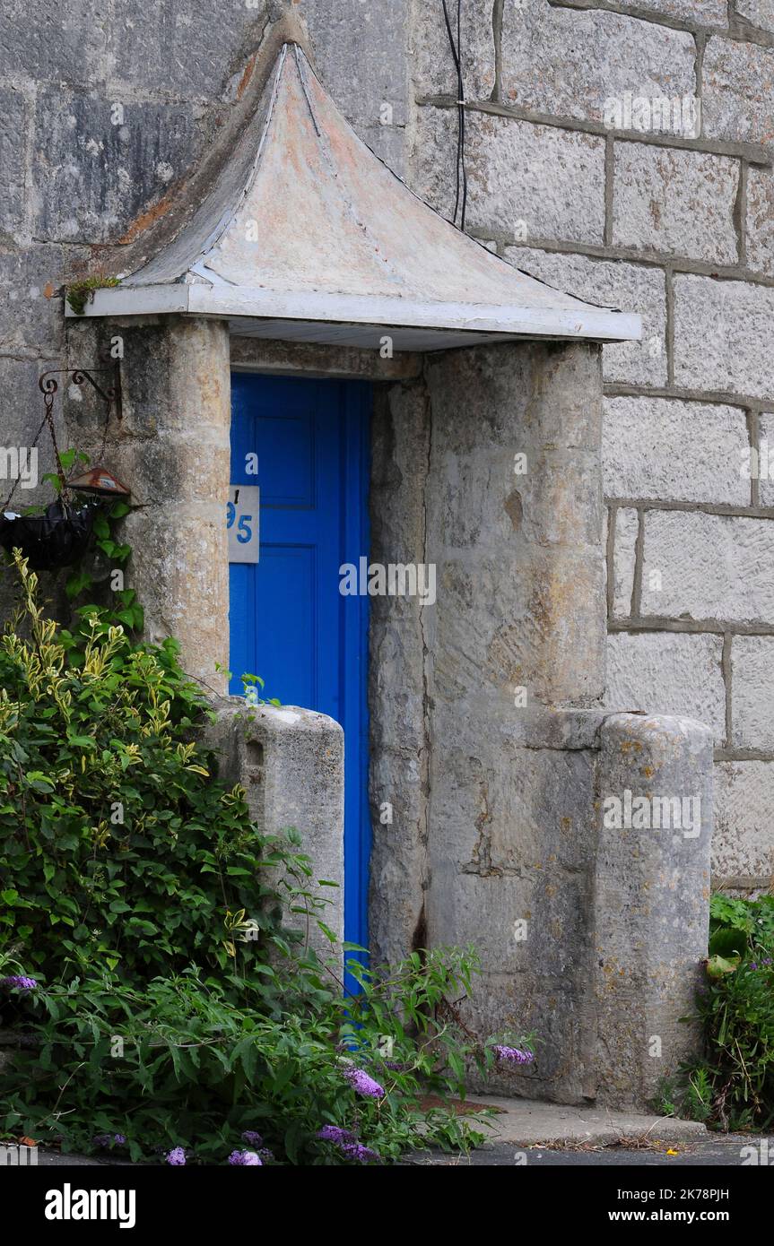Portland stone house porch with colonial style roof Stock Photo - Alamy