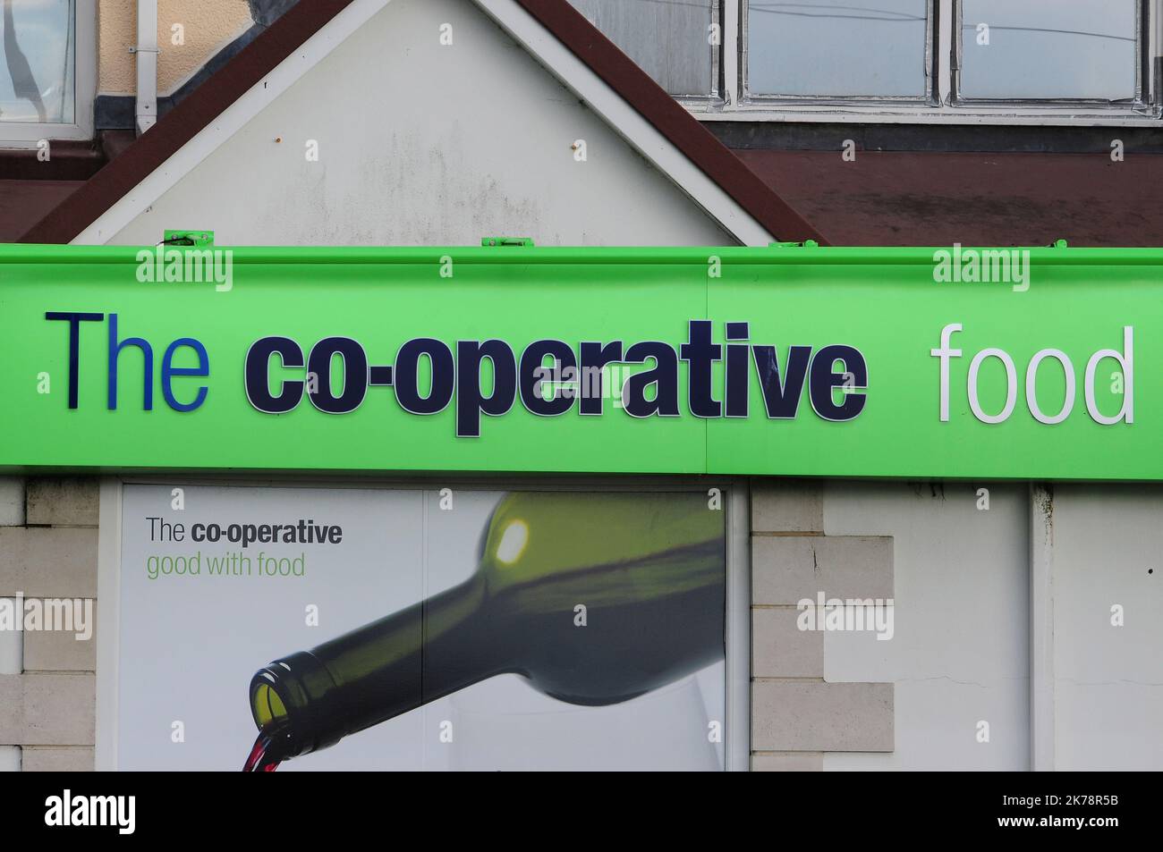 The green Co-operative supermarket sign Stock Photo - Alamy