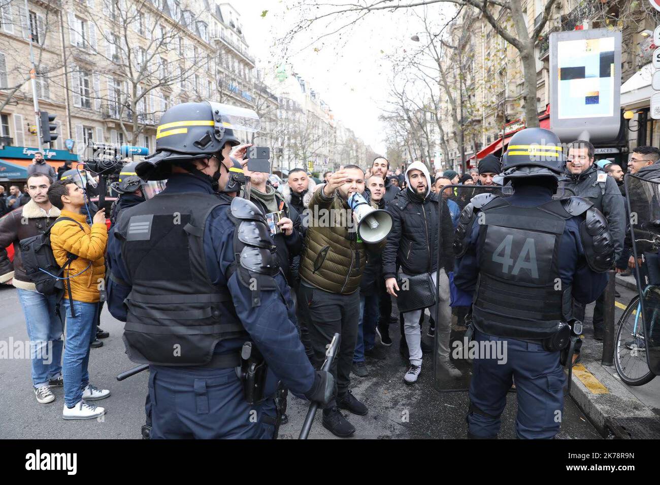 Railway workers demonstrate outside Gare de Lyon, December 23, 2019 ...