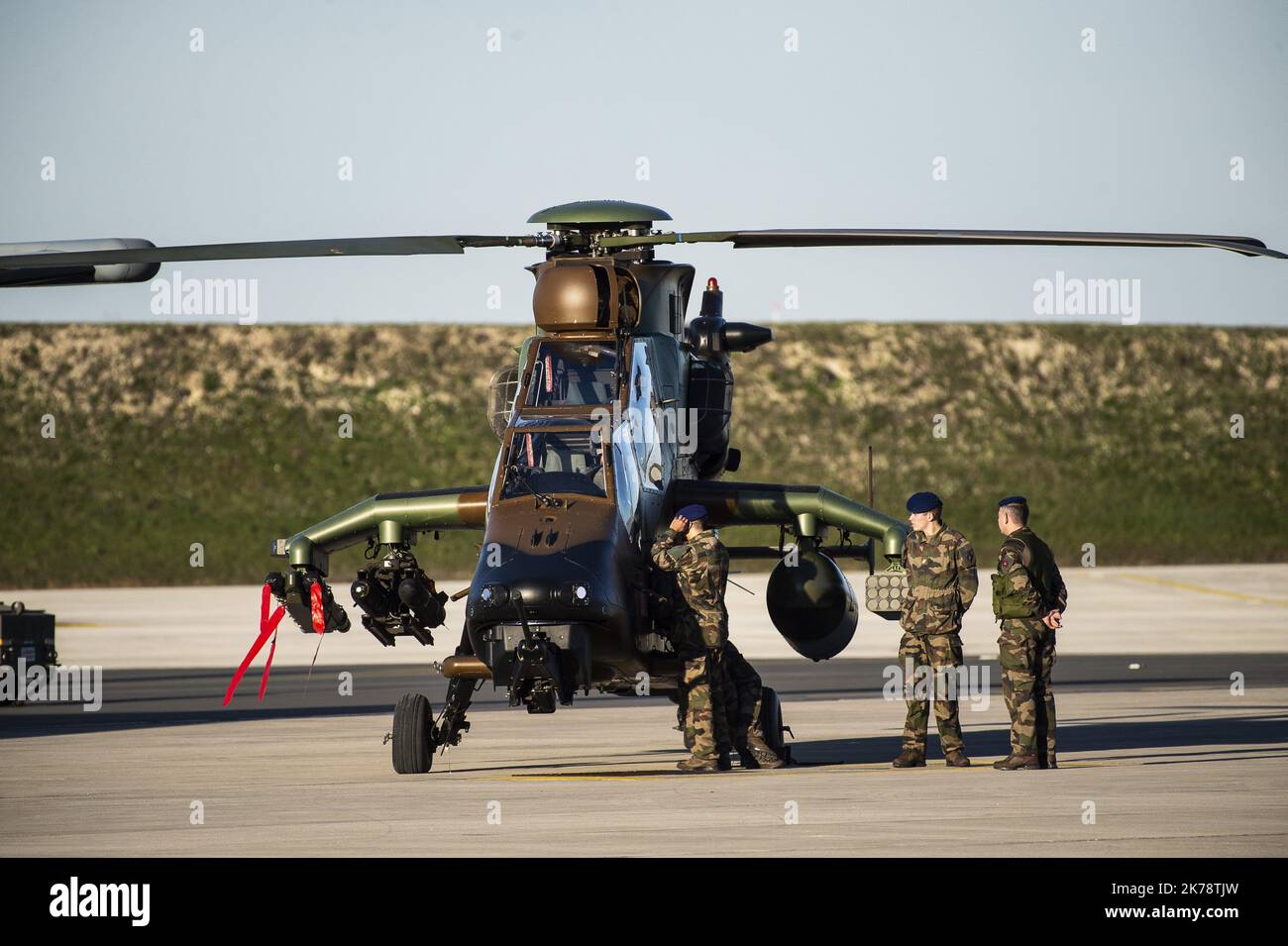 French President Emmanuel Macron reviews troops at the air base 123 of ...