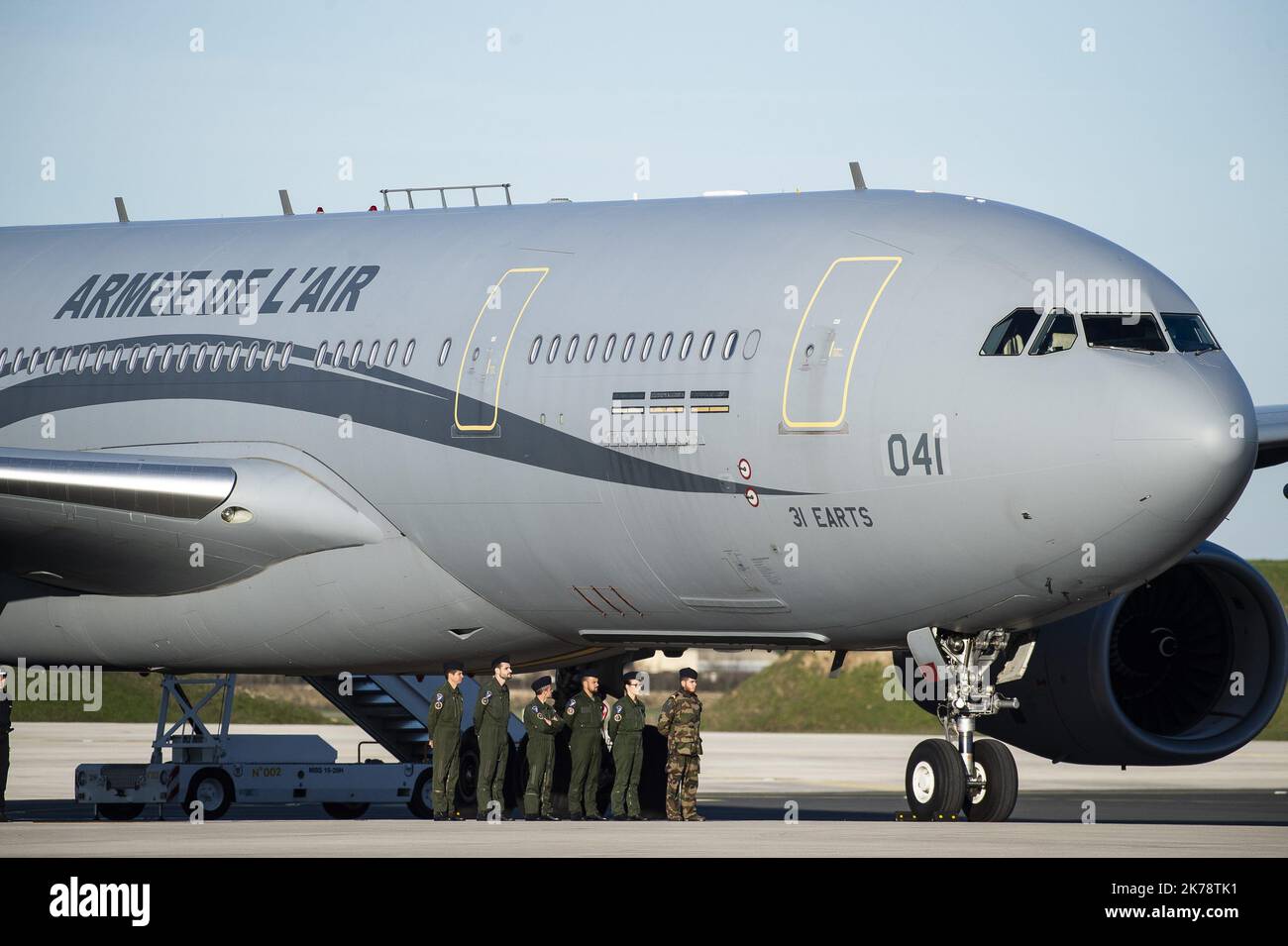 French President Emmanuel Macron reviews troops at the air base 123 of ...