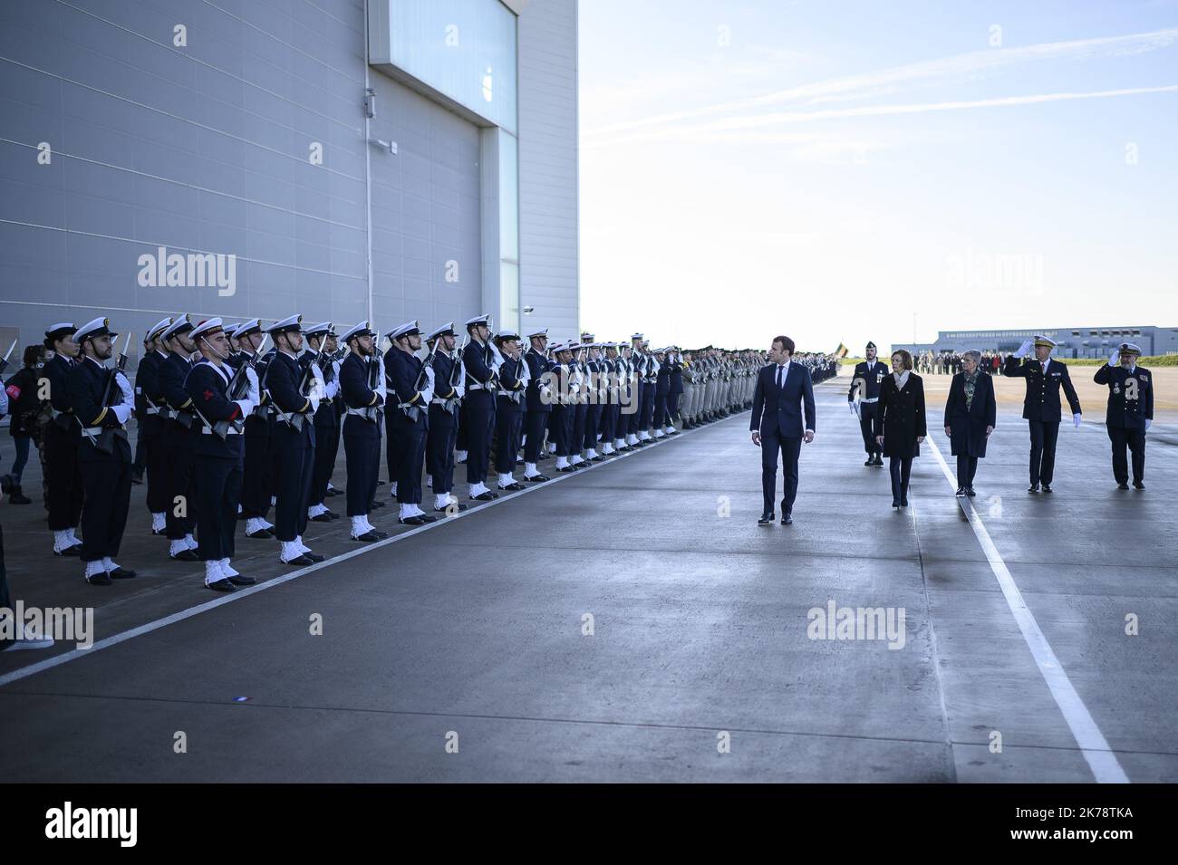 French President Emmanuel Macron reviews troops at the air base 123 of ...