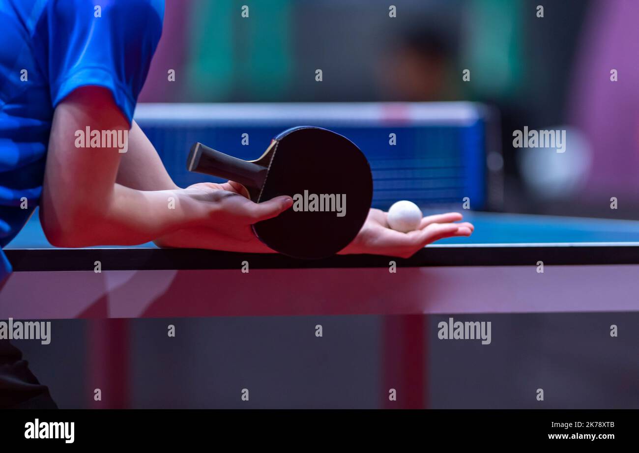 Ping pong table, professional woman playing table tennis with racket ...