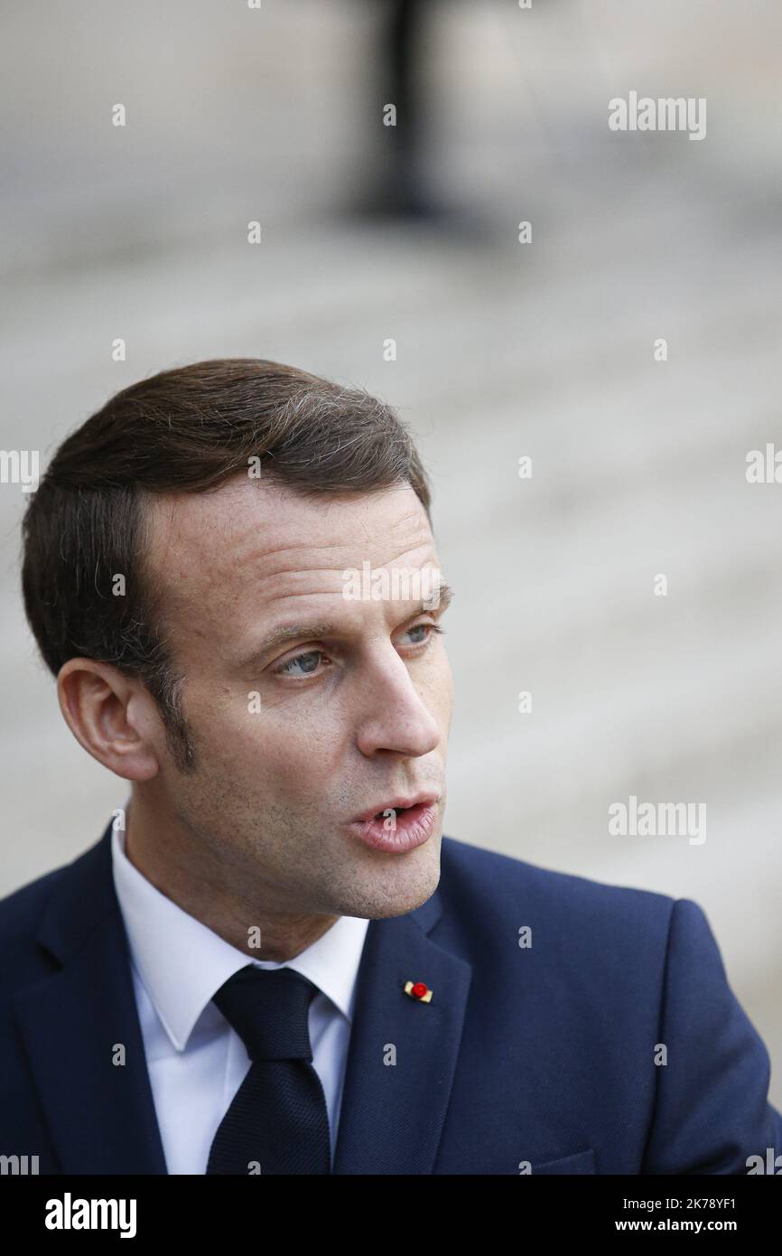 French's President Emmanuel Macron looks on as he speaks to the press ...