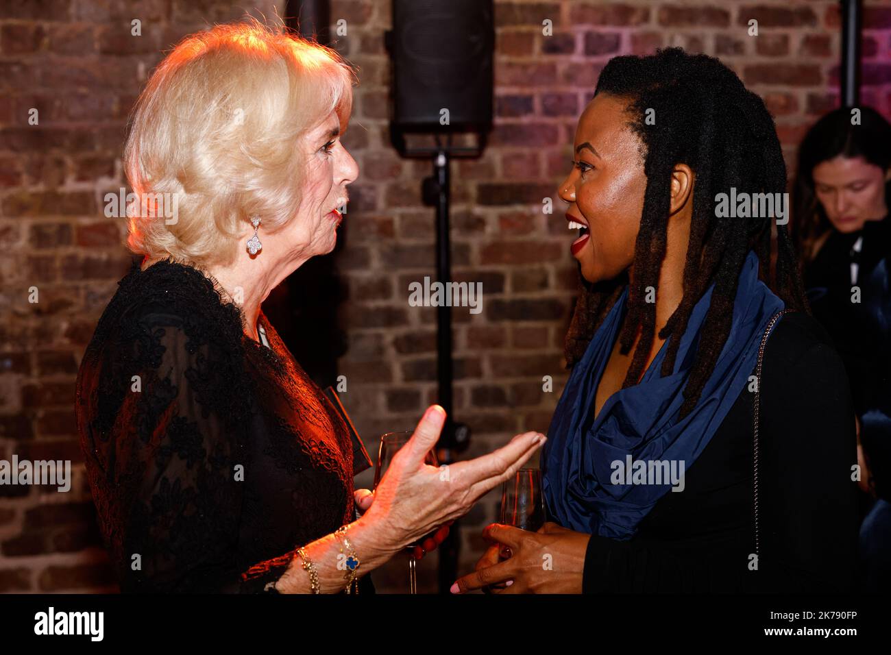 EDITORIAL USE ONLY The Queen Consort meets NoViolet Bulawayo, author of ...