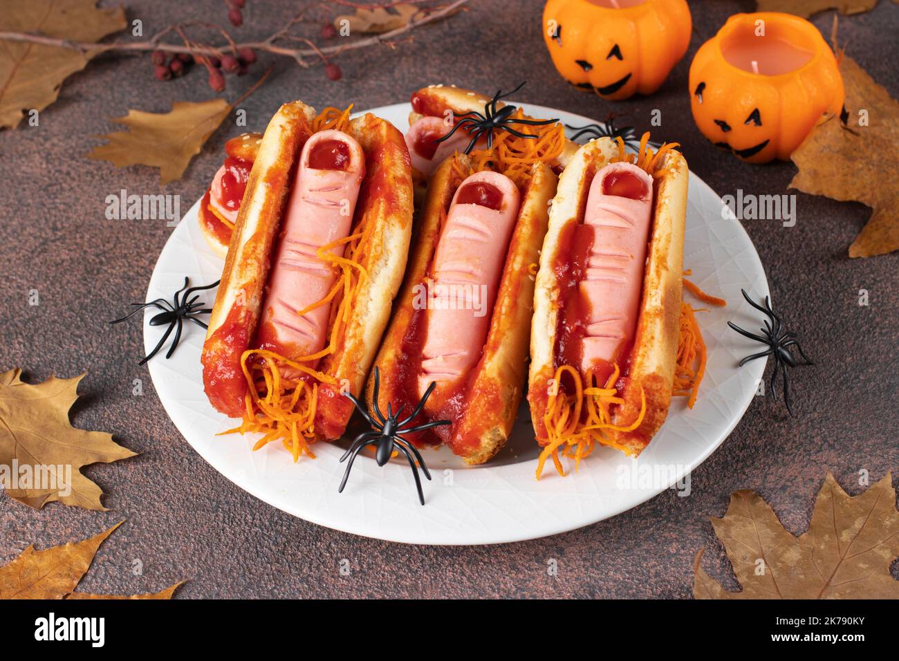 Themed food for Halloween - hot dog with bloody sausage fingers in ...