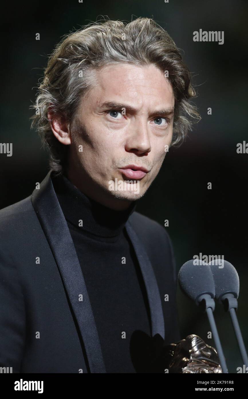 Swann Arlaud receives the best supporting actor award during the Cesar ...