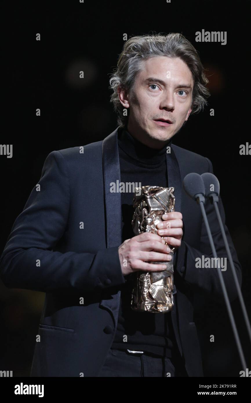 Swann Arlaud receives the best supporting actor award during the Cesar ...