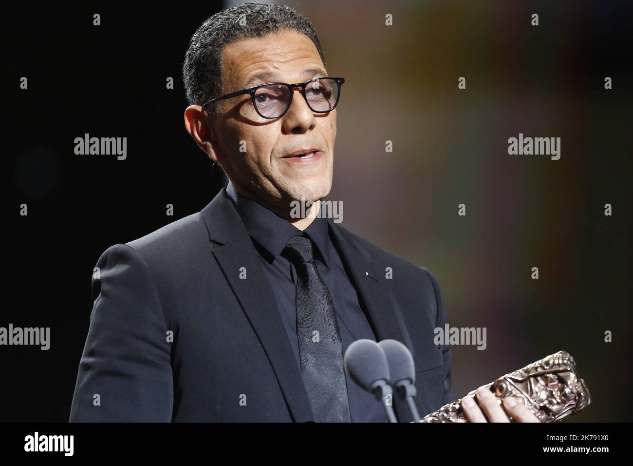 Roschdy Zem receives the best actor award during the Cesar Film Awards ...