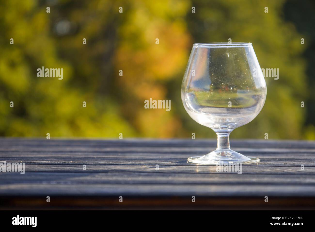 Clean wine glass on blurred background Stock Photo - Alamy
