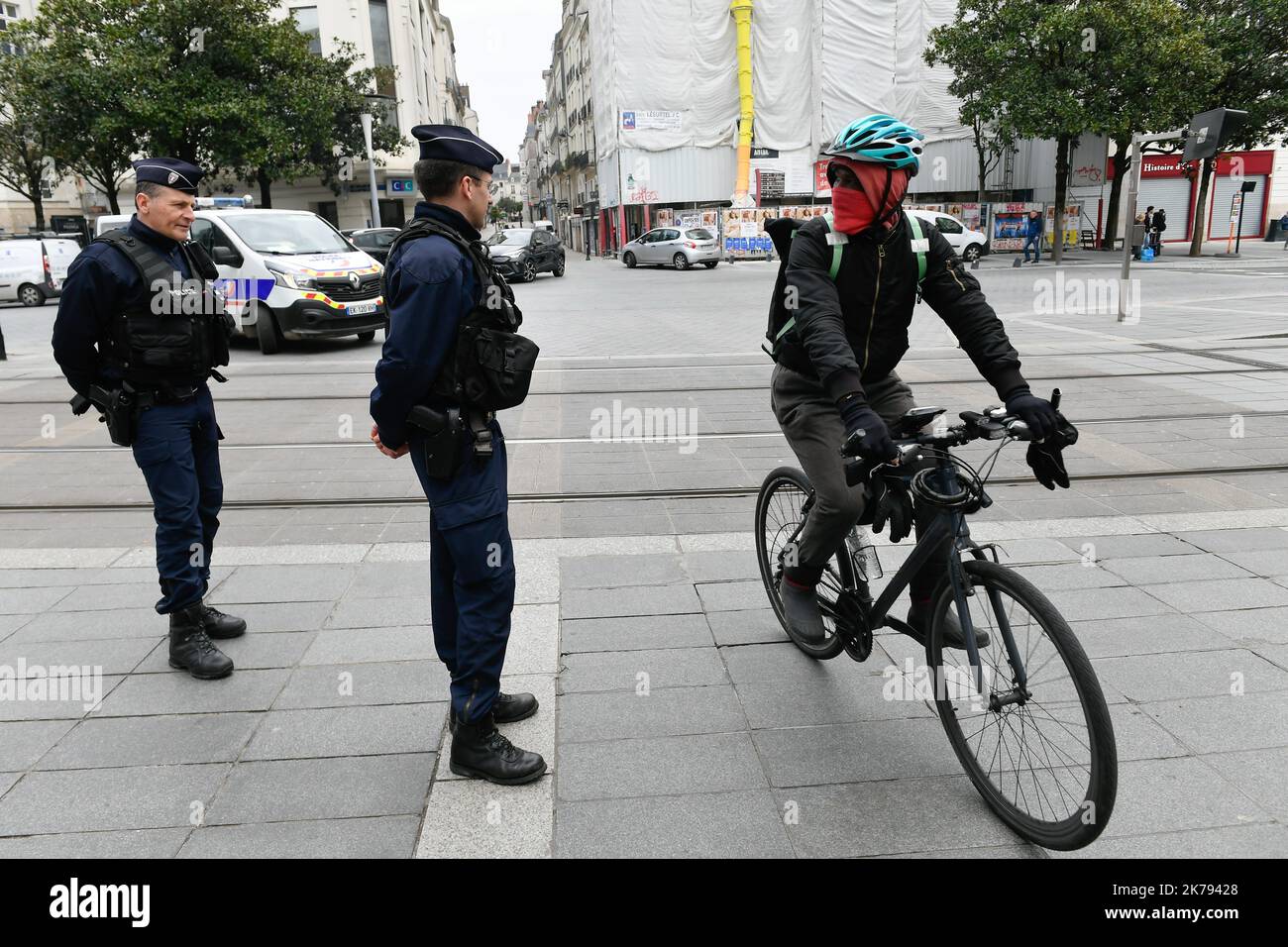 The national police patrol the streets to ensure proper compliance with ...