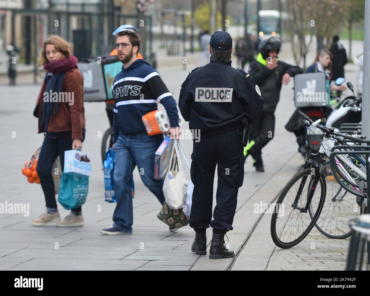 The national police patrol the streets to ensure proper compliance with ...
